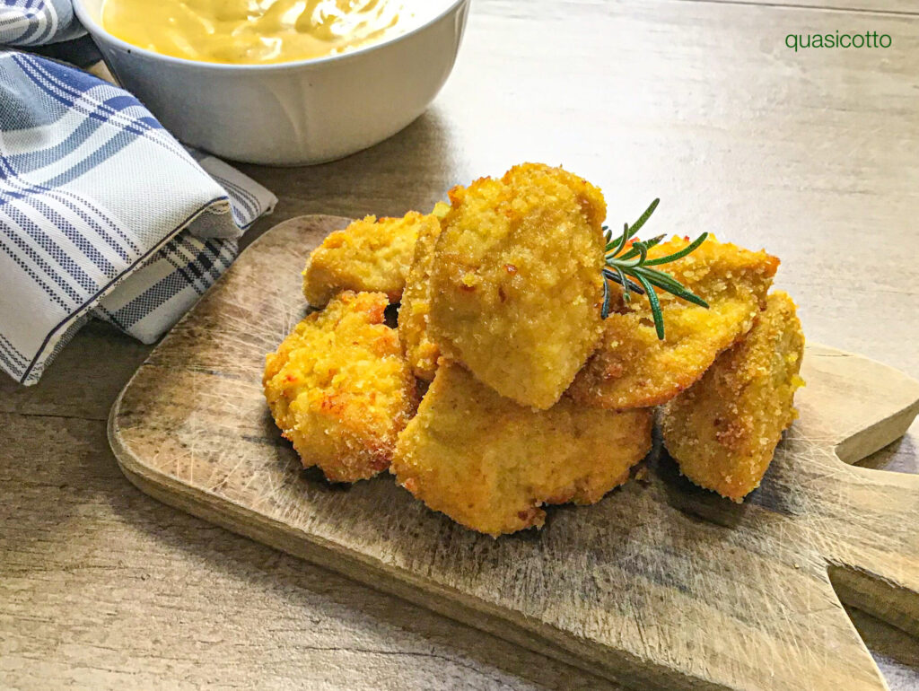 Pollo a bocconcini impanato e fritto in friggitrice ad aria, senza uovo