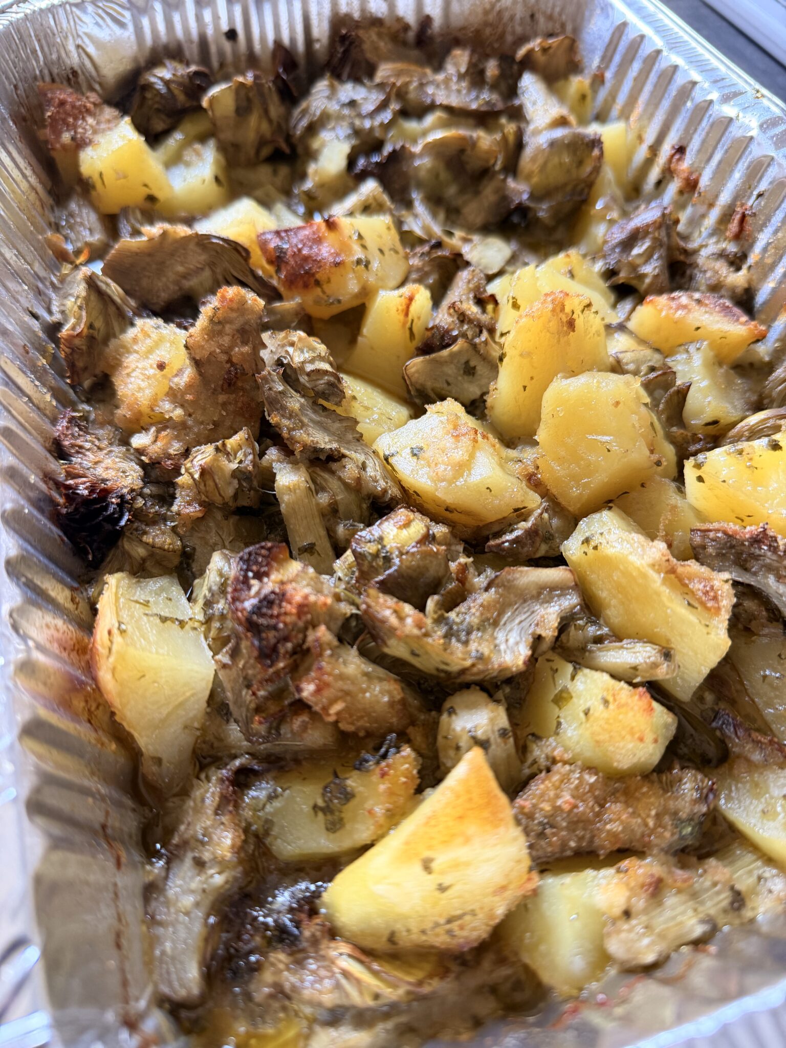 Carciofi e patate al forno gratinate - Le ricette di iocucinofacile