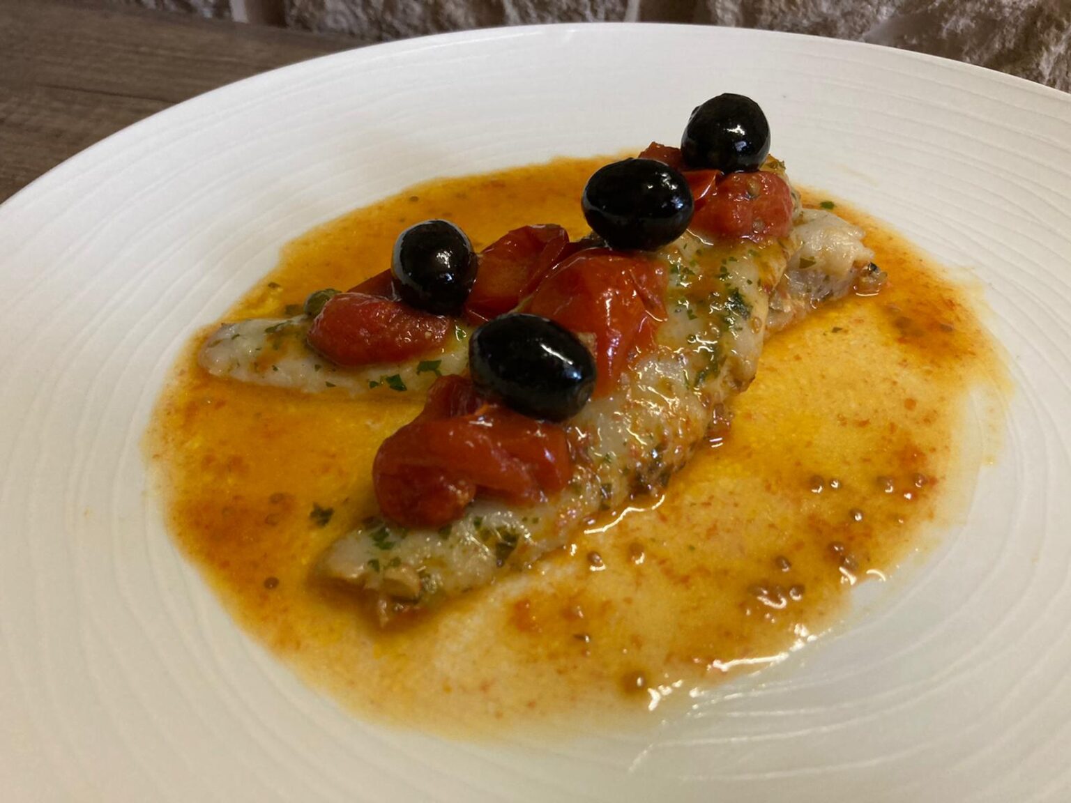 Nasello in padella con pomodorini: ricetta